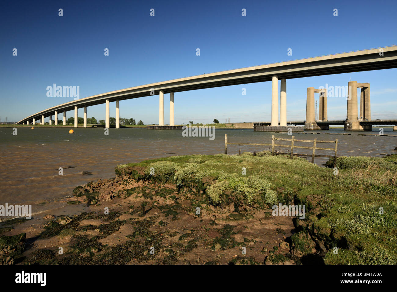 The new Isle of Sheppey crossing towers over the old Kingsferry ...