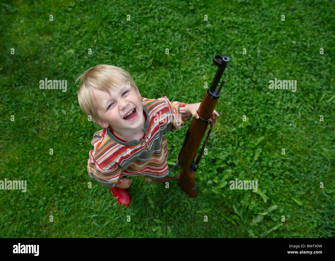 Boy air gun hi-res stock photography and images - Alamy