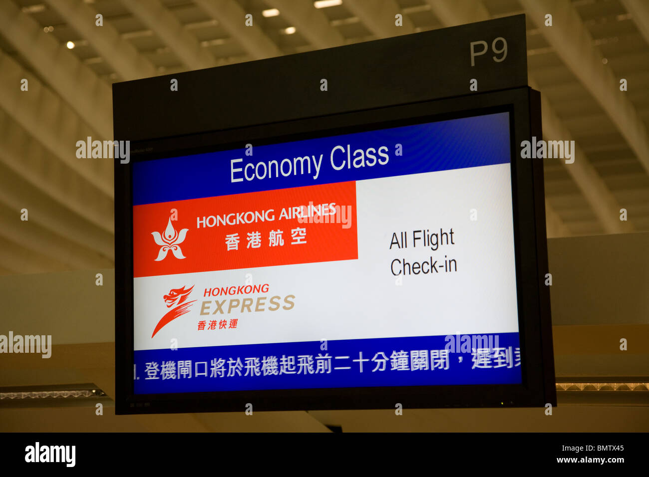 Airasia check in desk sign chek lap kok airport Stock Photo - Alamy