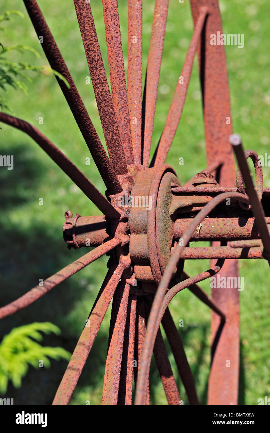 Rusted wheel of antique farm tractor plow Long Island NY Stock Photo ...