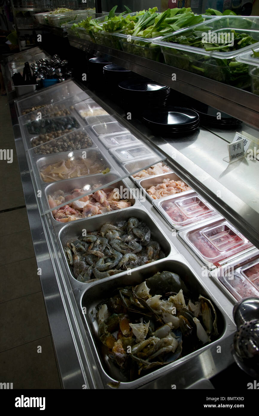 Claypot street restaurant pavement stall singapore Stock Photo - Alamy