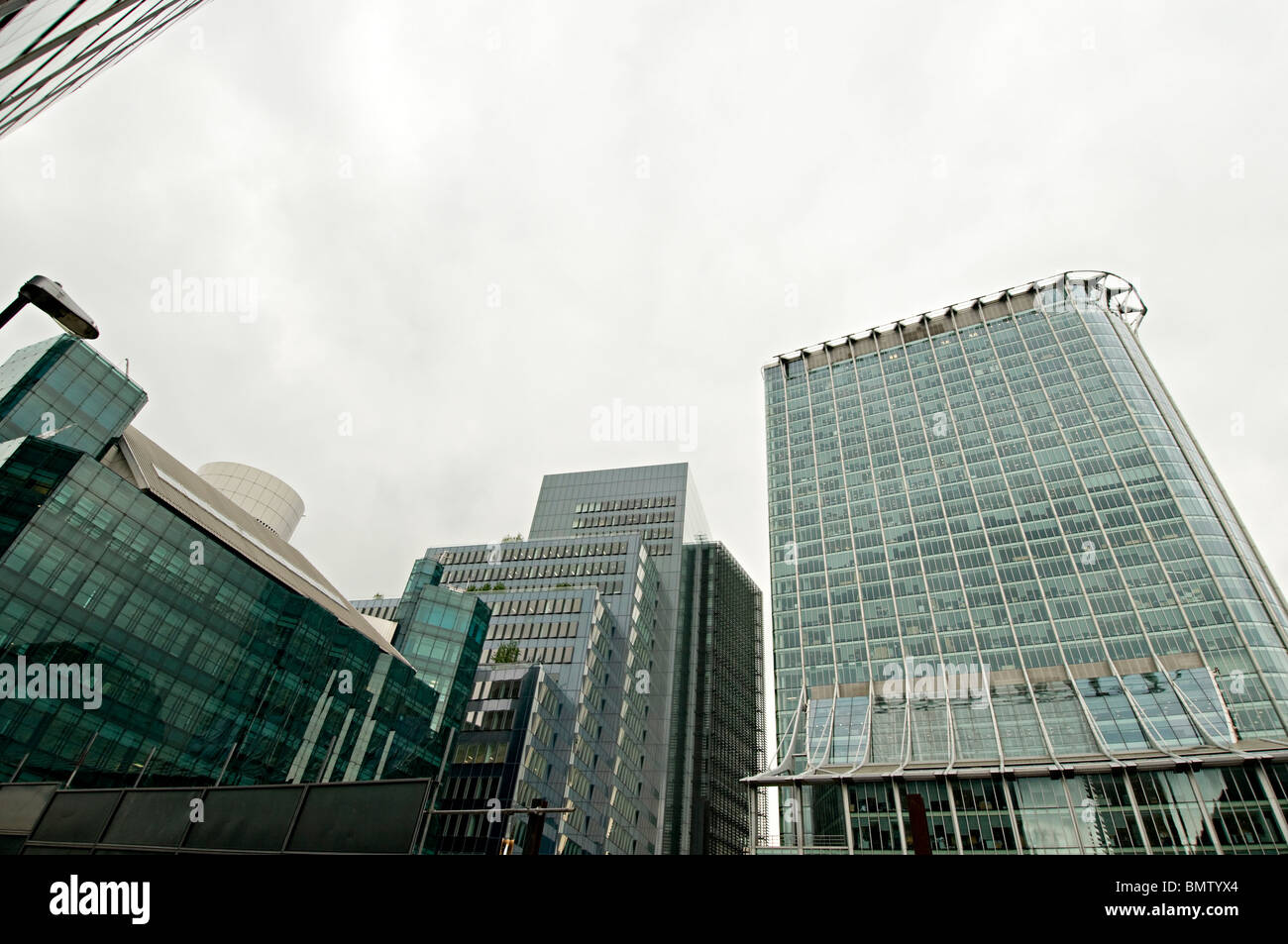 high rise offices in the city of london with large expanses of glass ...