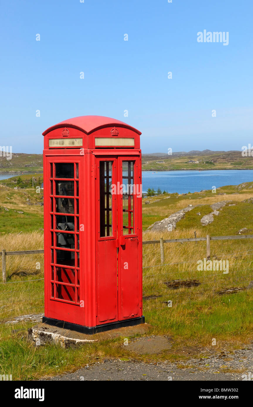 Old style red UK phone box in a rural setting Stock Photo - Alamy