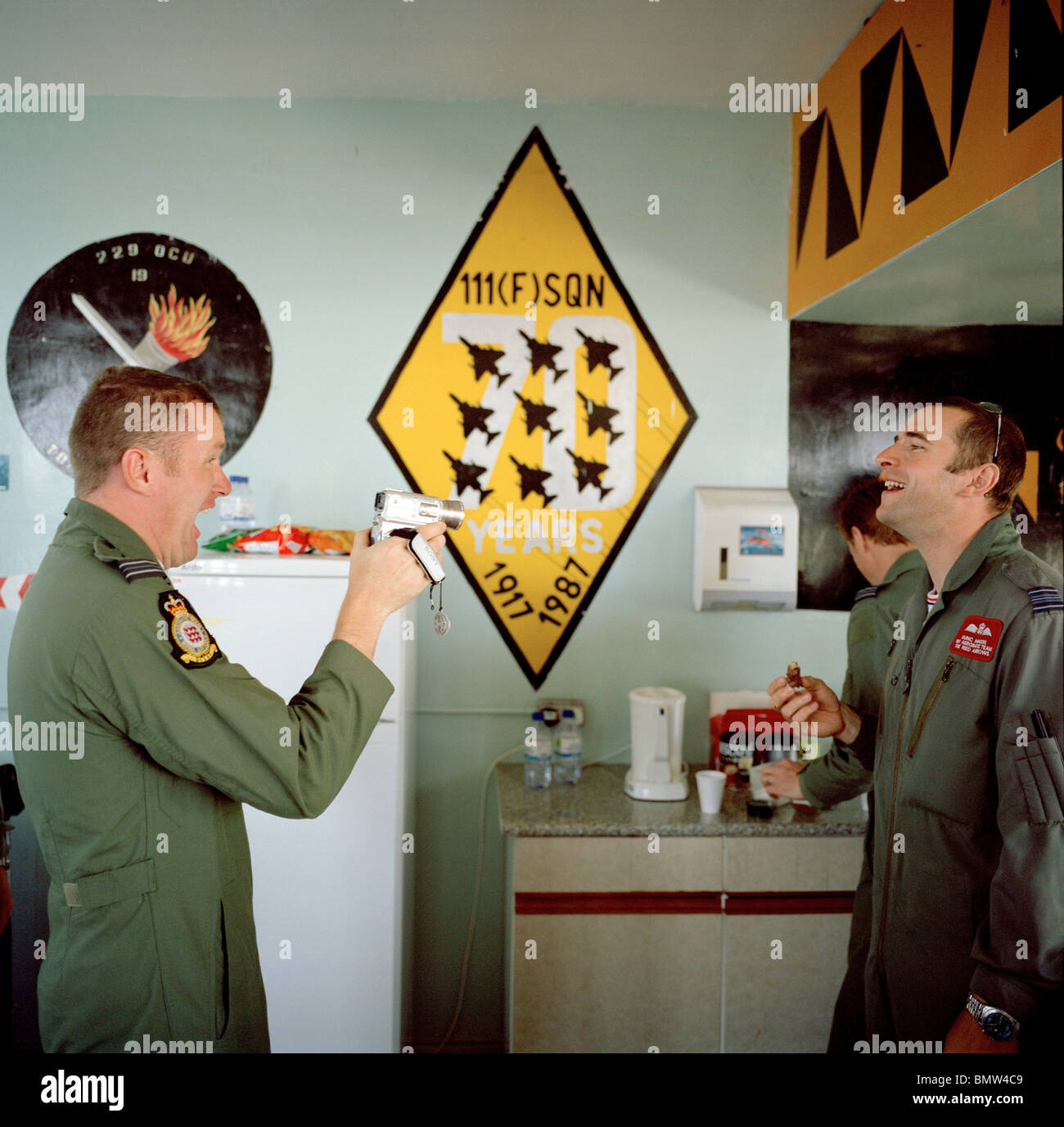 Relaxing after demanding training flight, RAF pilots exchange banter in ...