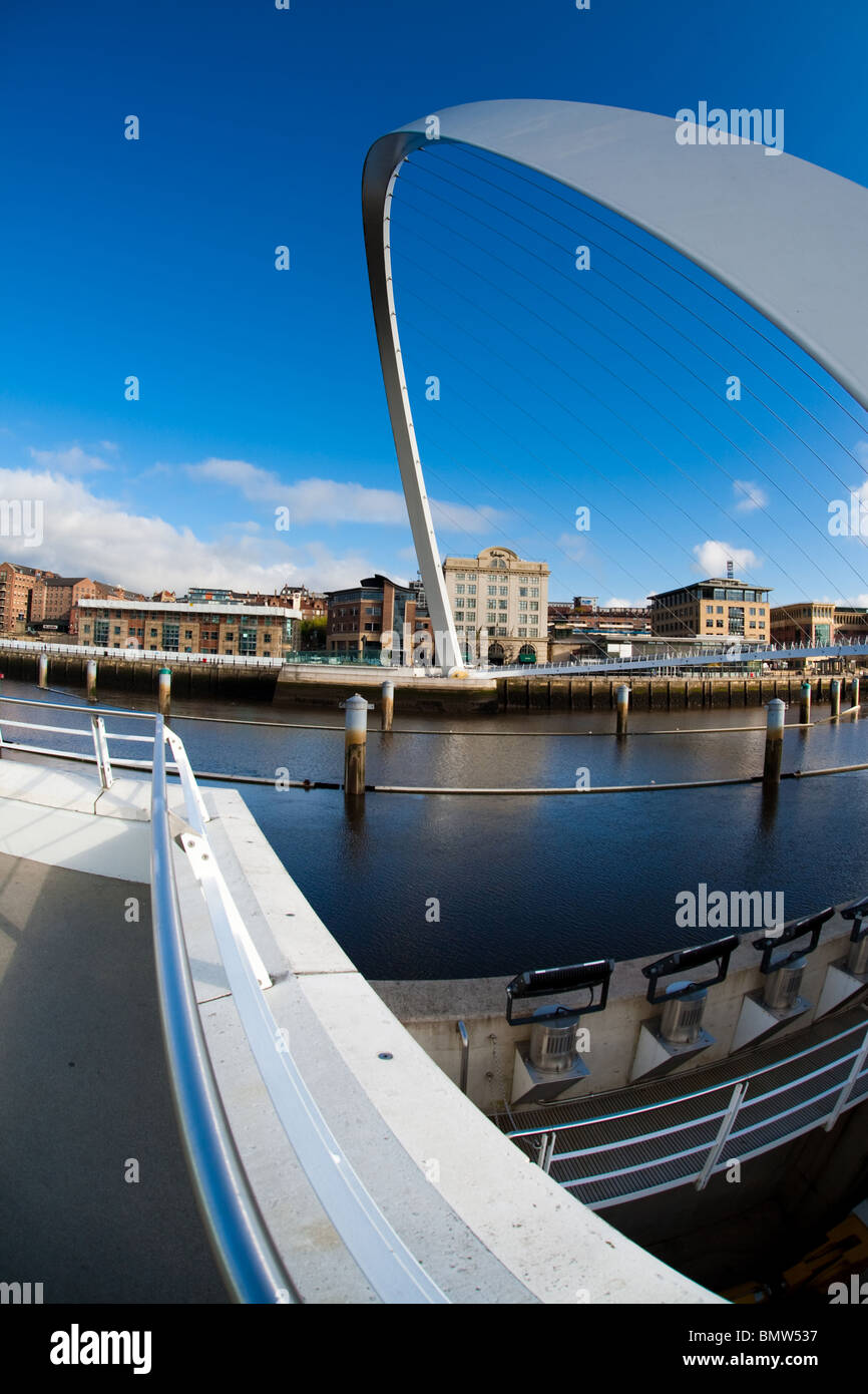The Millenium Bridge foot bridge crossing the River Tyne Stock Photo ...