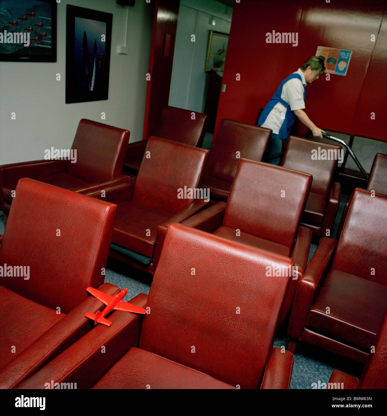 Contract cleaner hoovers pilots' crew room of the 'Red Arrows', Britain ...