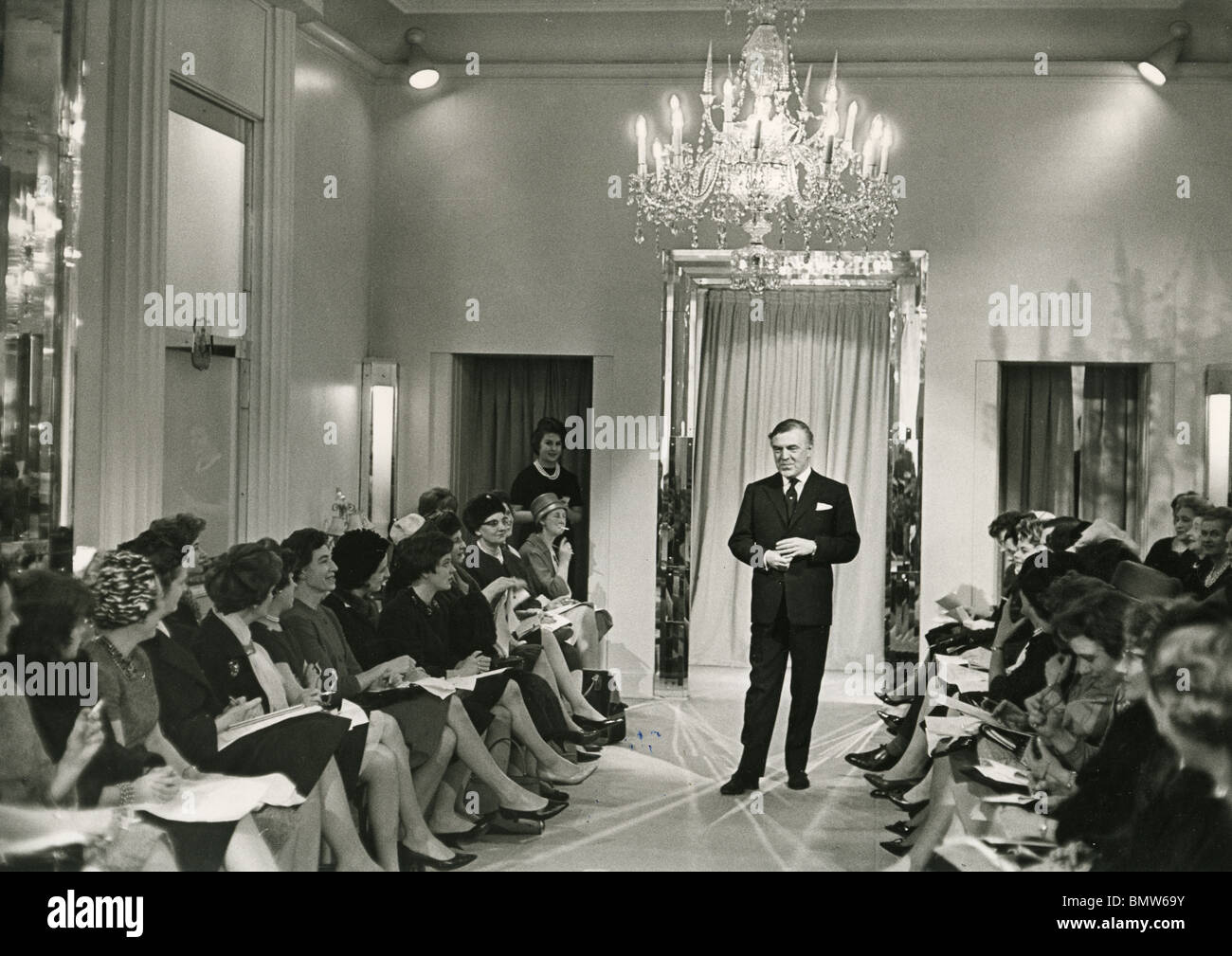 NORMAN HARTNELL - English fashion designer in his salon at 26 Bruton ...