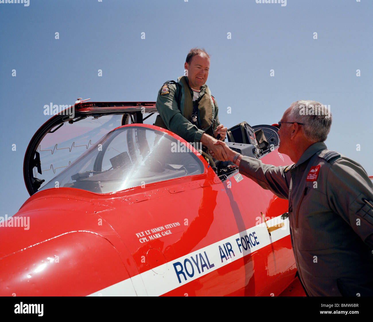 Senior officer congratulates other pilots of the 'Red Arrows', Britain ...