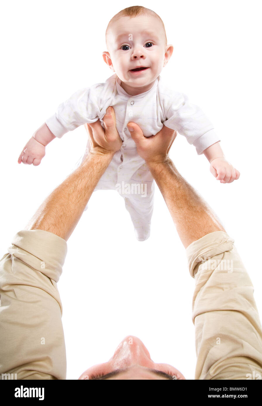 Men's hands hold the baby on a white background Stock Photo - Alamy