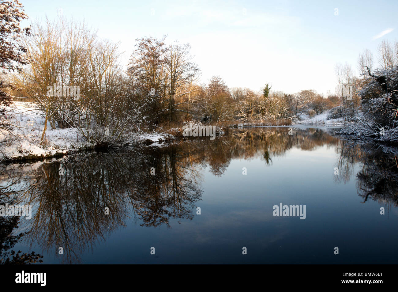 A view of a lake in winter with snow Stock Photo - Alamy