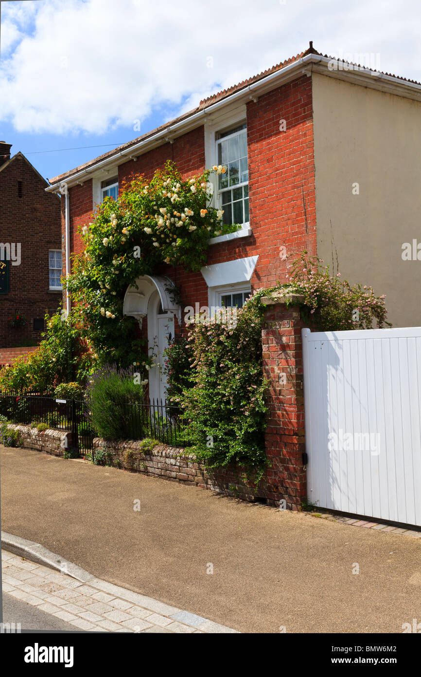 Attractive house with a rose covered porch in the Village at ...