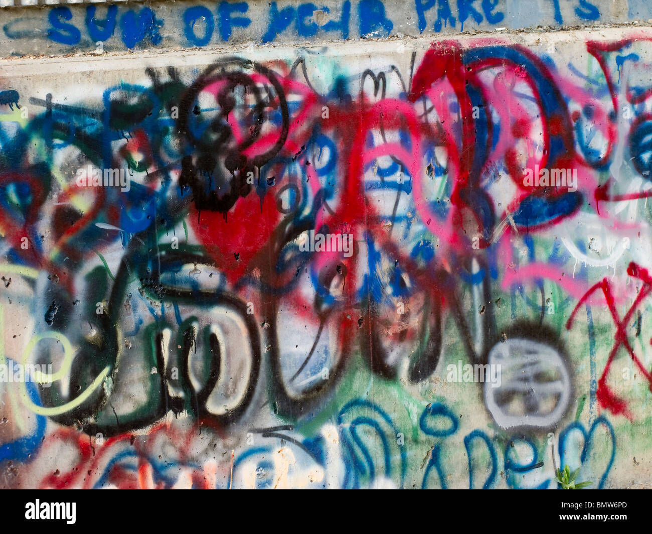 Graffiti on cement wall Stock Photo - Alamy