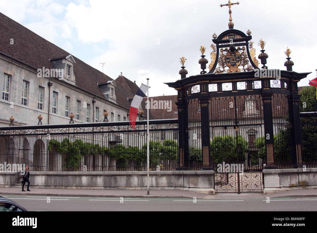 French hospital main building entrance flag cross Stock Photo - Alamy