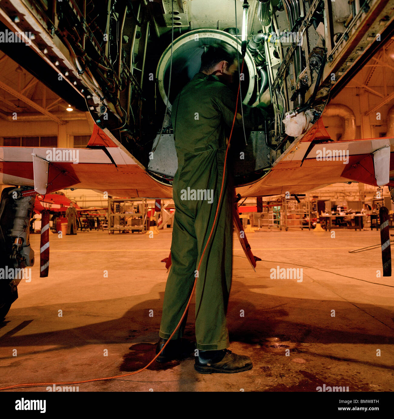 Propulsion engine specialist inspects internal Hawk of the 'Red Arrows ...