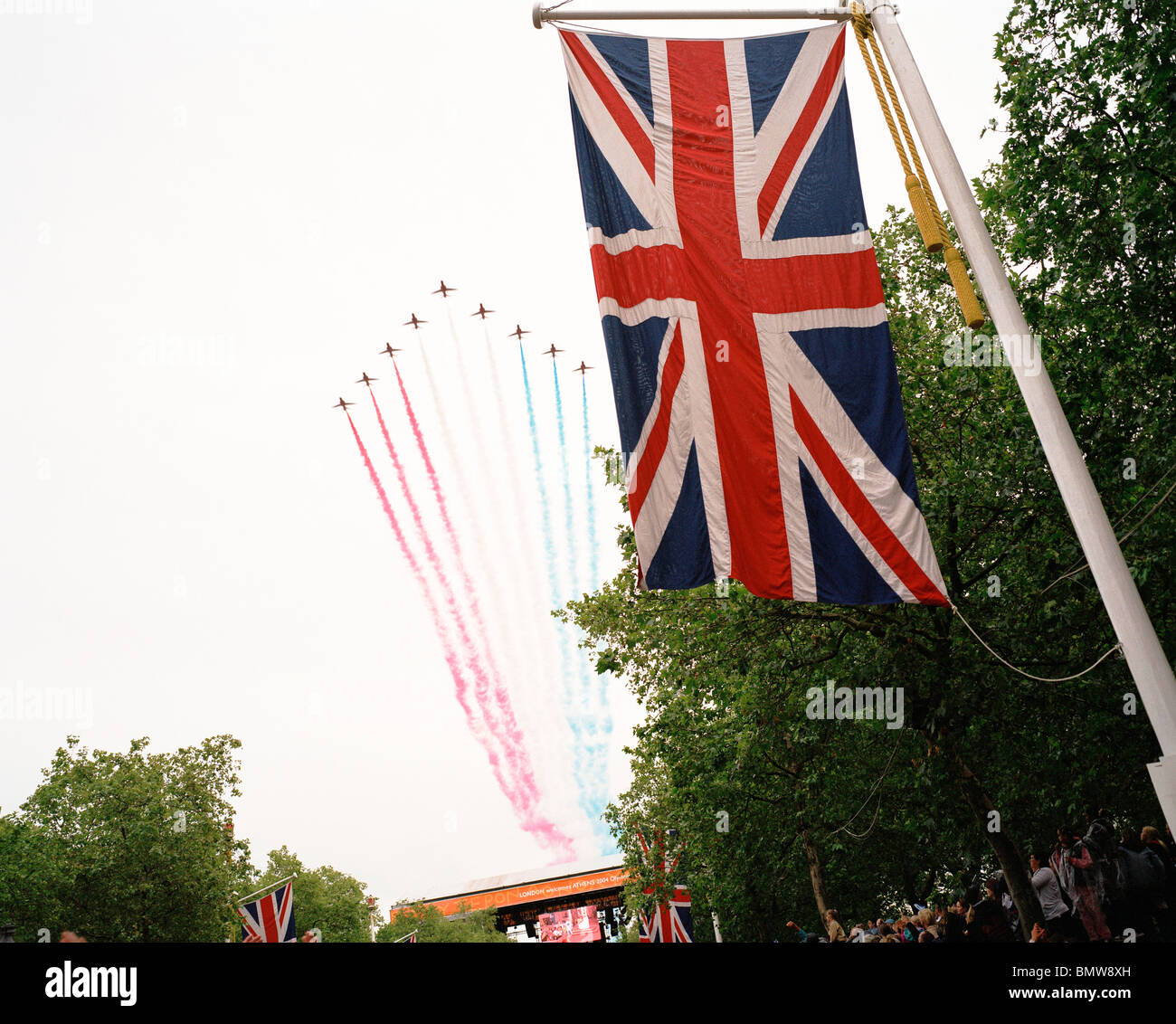 A fly-past over The Mall in London by the 'Red Arrows', Britain's Royal ...