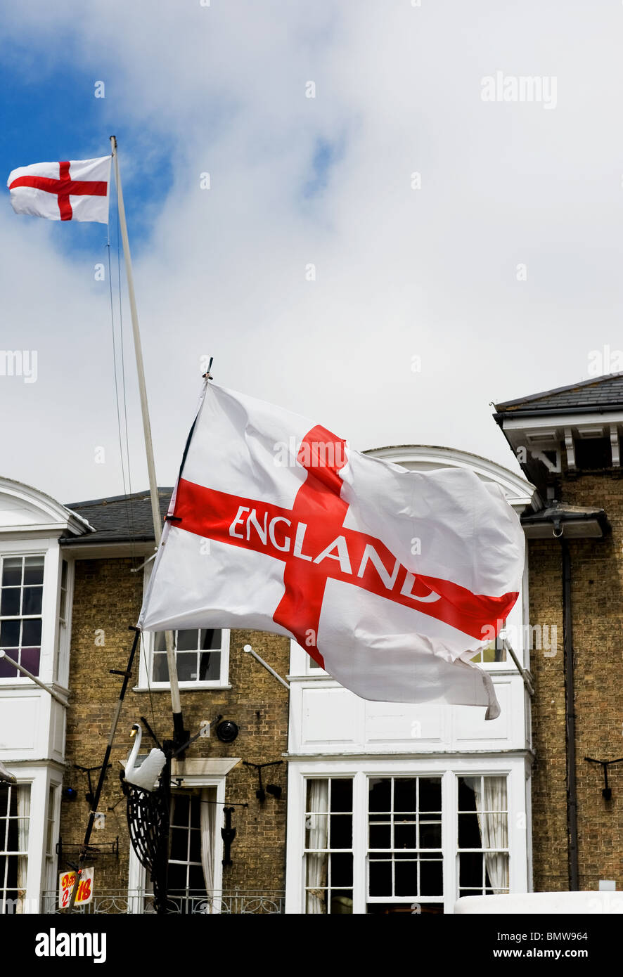 A large England flag in front of buildings Stock Photo - Alamy