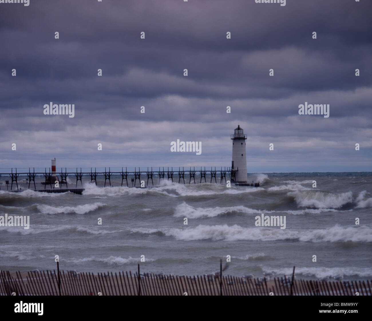 Lighthouse in Storm on Lake Michigan, MI Stock Photo - Alamy
