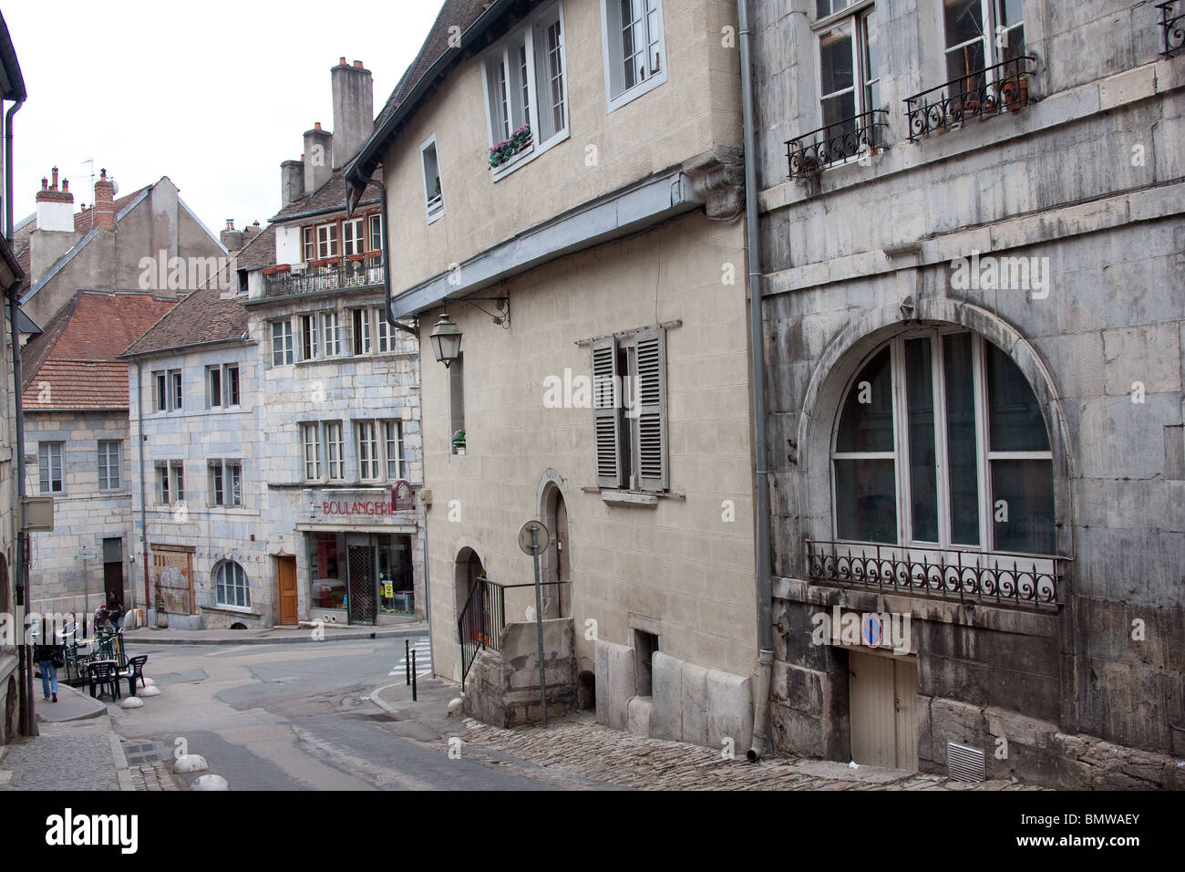 narrow windows door street hill shop buildings Stock Photo - Alamy