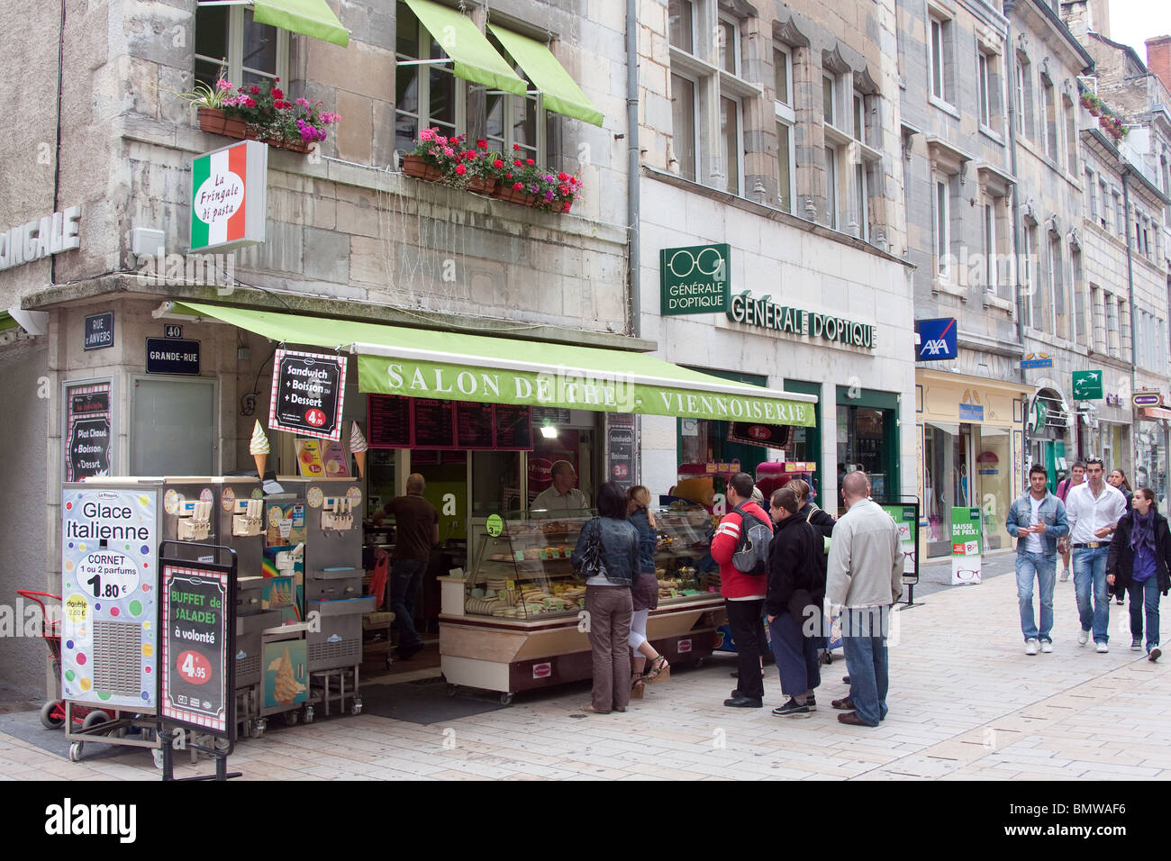 narrow windows door street shop buildings people Stock Photo - Alamy