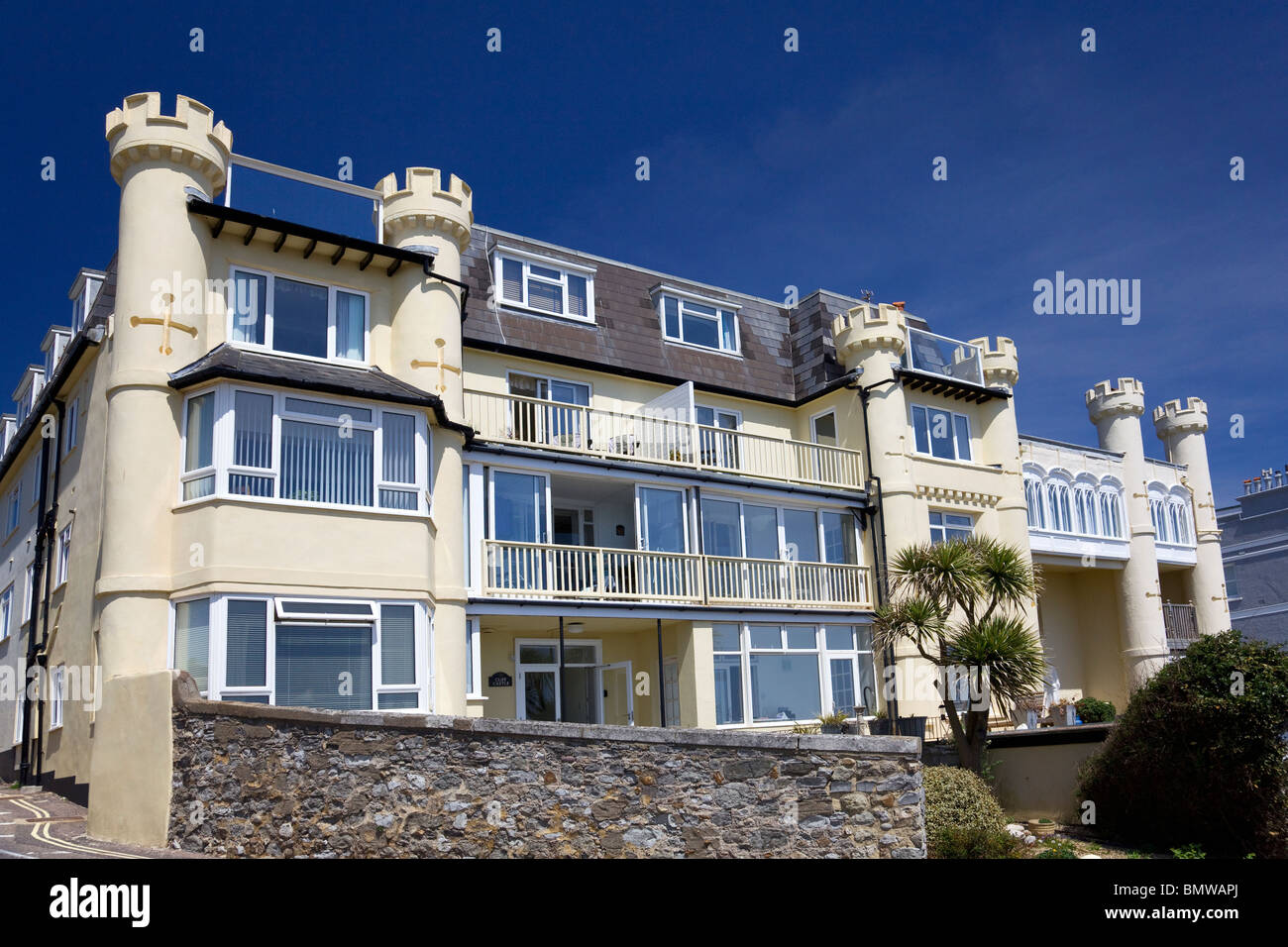 Large house on the sea front with castellated columns, Seaton, Devon ...