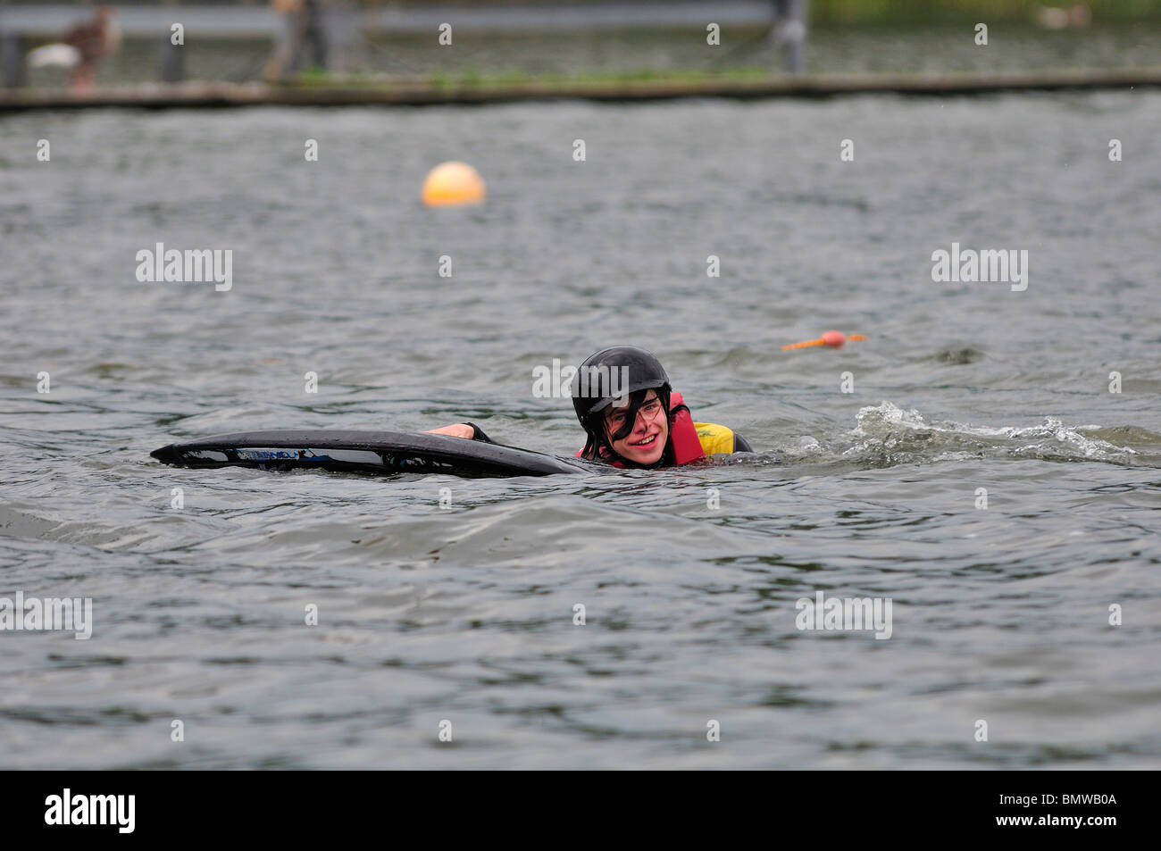 Man falls in water whilst wake boarding Stock Photo - Alamy