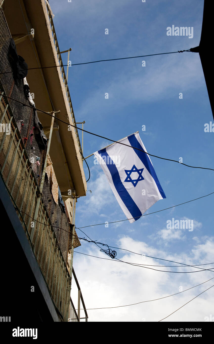 Israeli flag in Jerusalem Old City street Stock Photo - Alamy