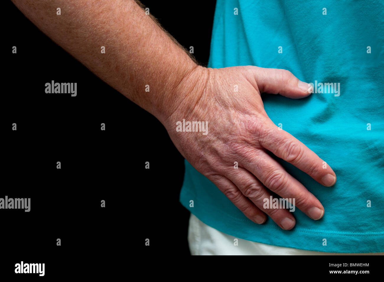 A man places his hand on a woman's hip. Closeup,cutout. Black ...