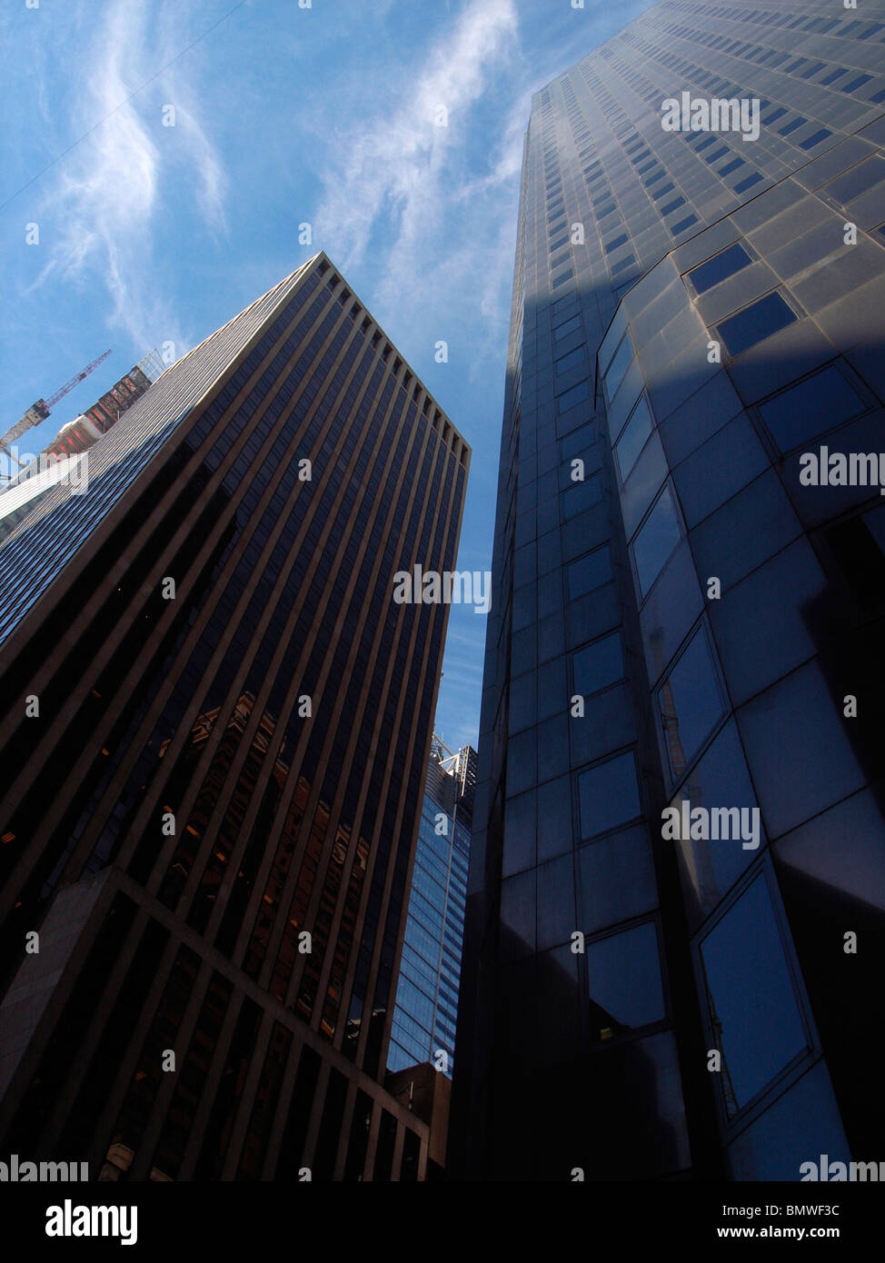 Looking up New York Skyscrapers from ground level in New York City, USA ...