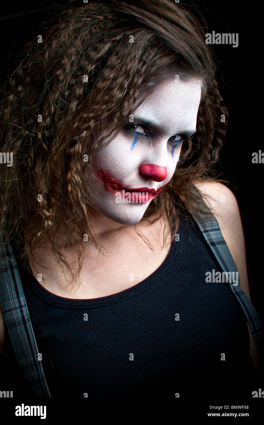 a scary and evil looking female clown Stock Photo - Alamy