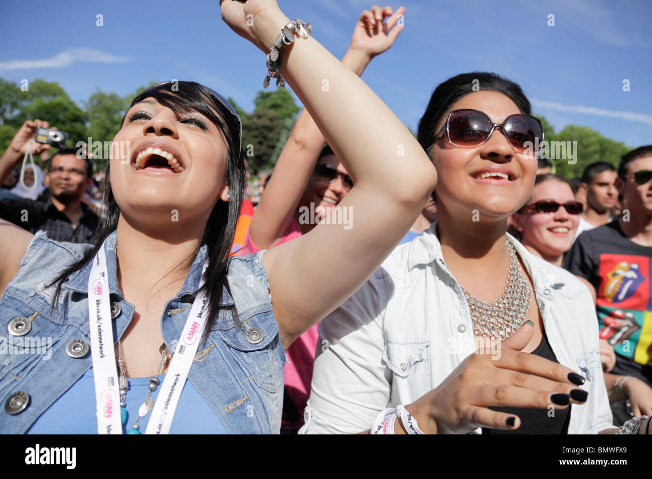 Happy women in crowd hi-res stock photography and images - Alamy