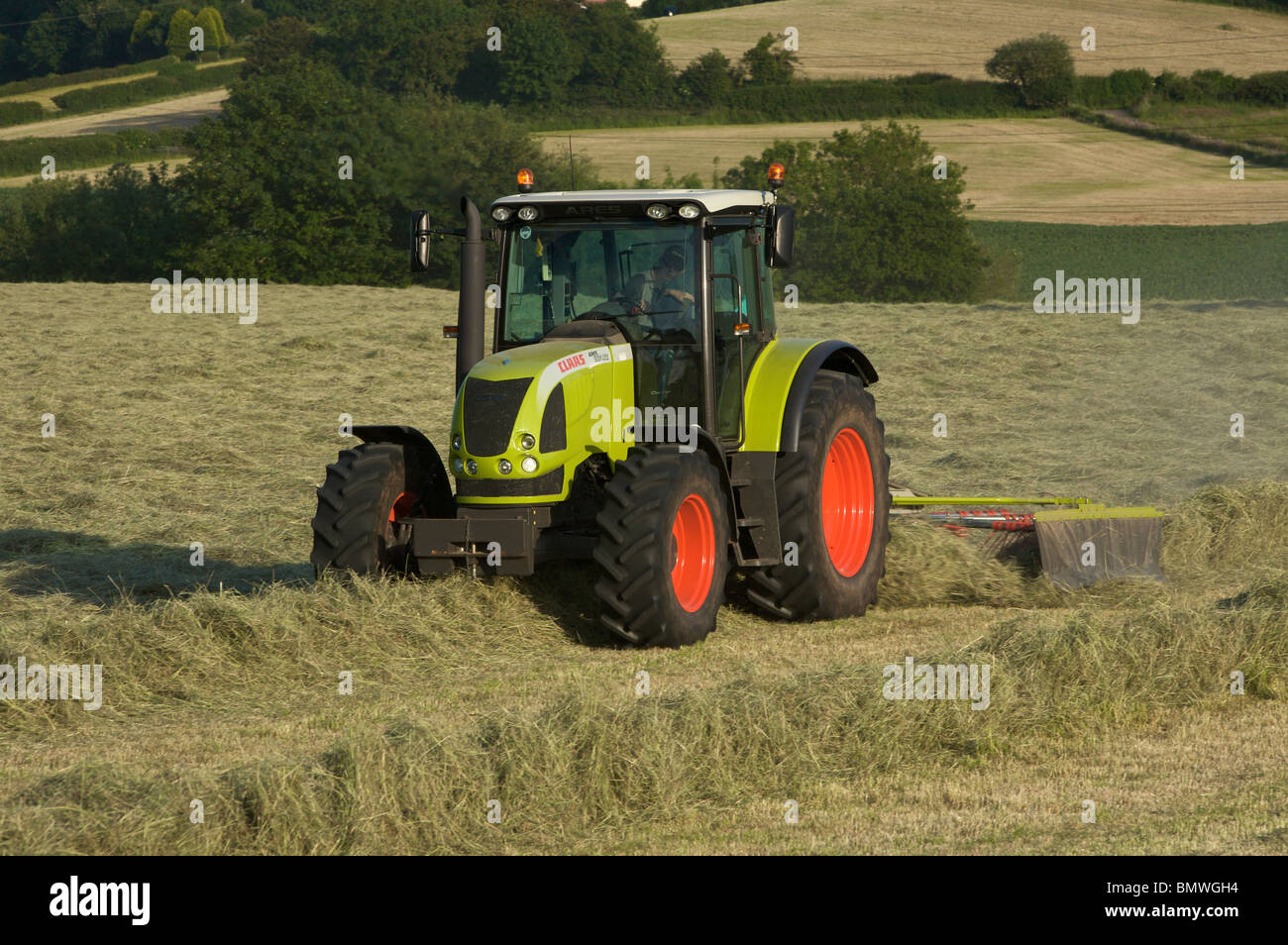 Claas Ares 697ATZ rowing up a hay crop Stock Photo - Alamy