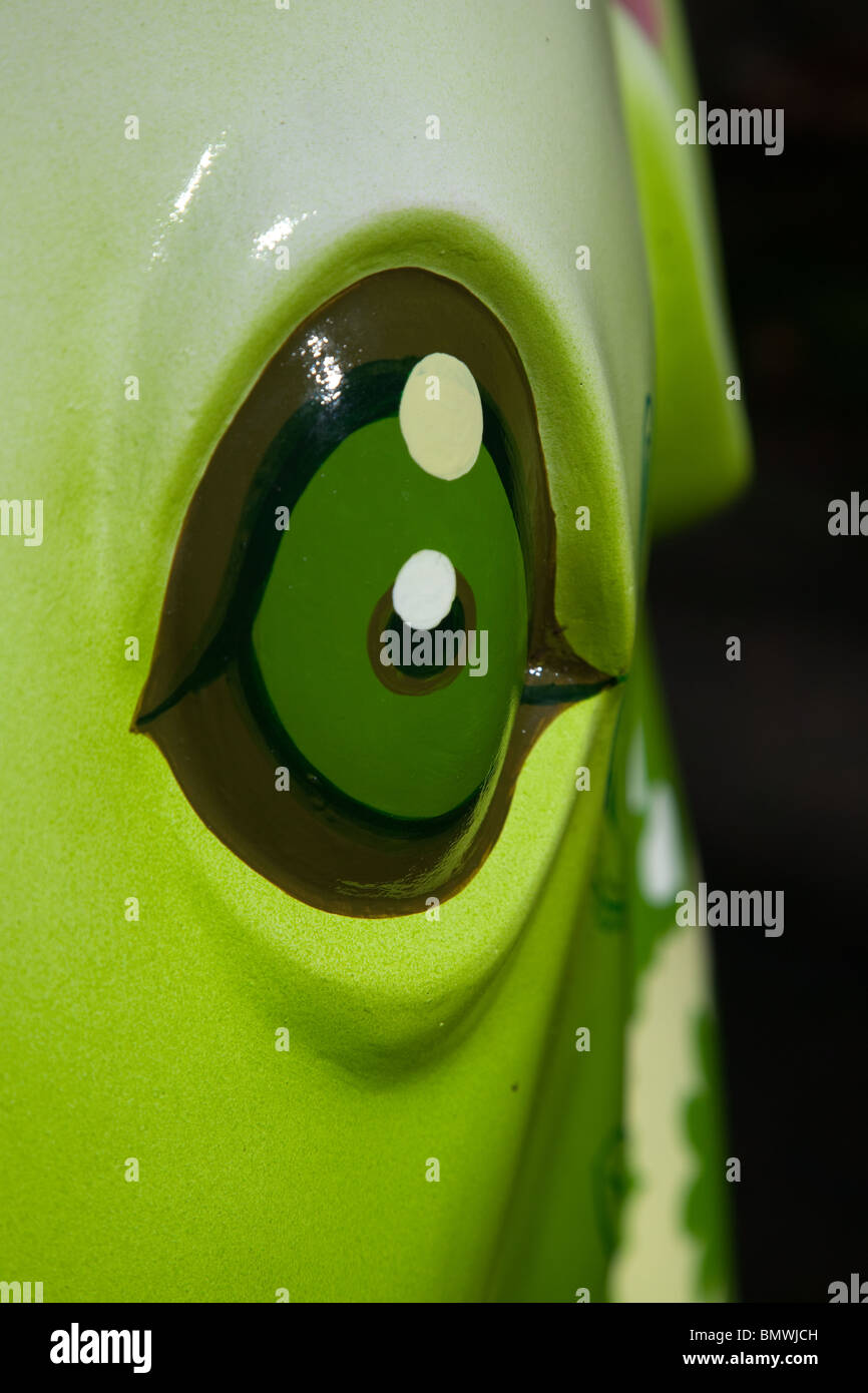 The eye of green elephant statue Stock Photo - Alamy