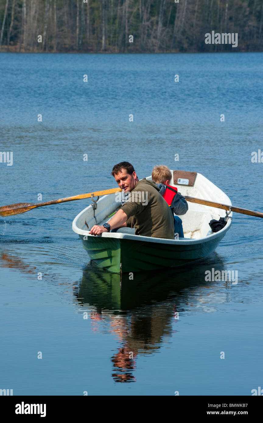 Boy rowing boat hi-res stock photography and images - Alamy