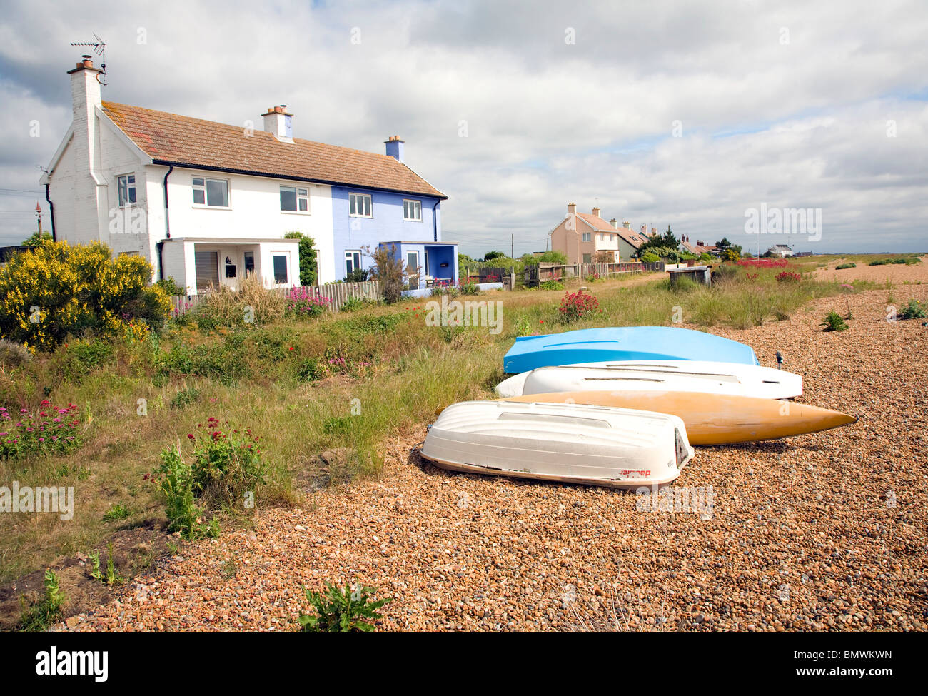 Boats, beach, houses Shingle Street, Suffolk, England Stock Photo - Alamy