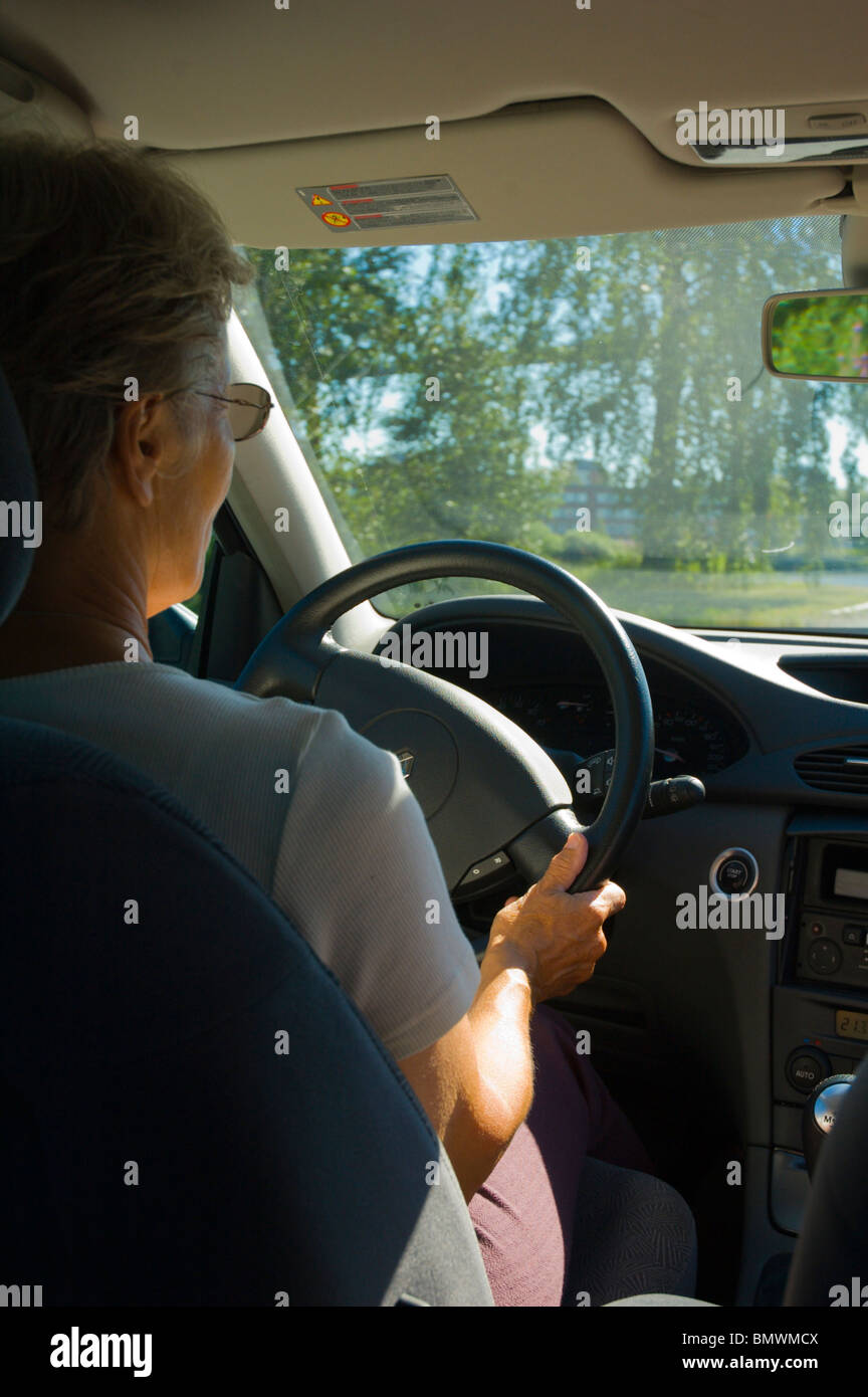 Mature woman driving a car Pori western Finland Europe Stock Photo - Alamy