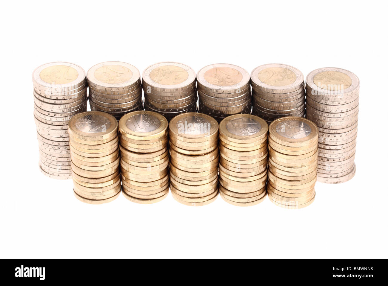 Coins organized in columns and rows isolated on white background Stock ...