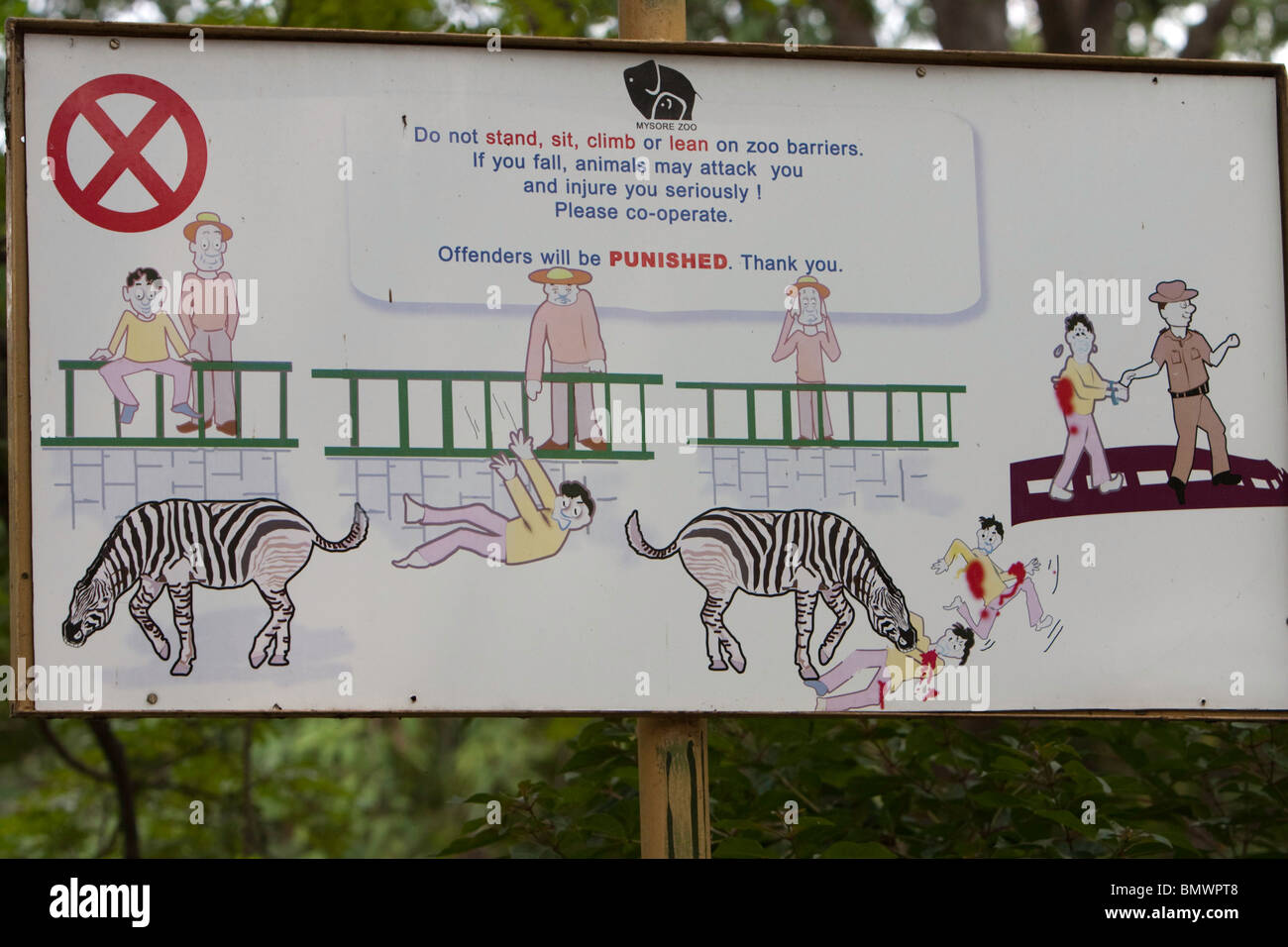 A warning sign at Mysore Zoo, India Stock Photo - Alamy
