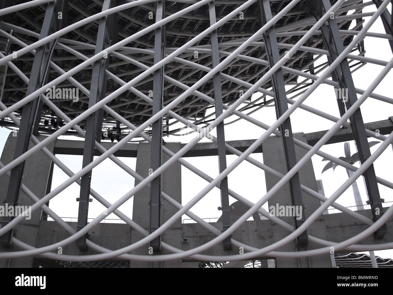 A partial view of a modern structure with curved steel tubes Stock ...