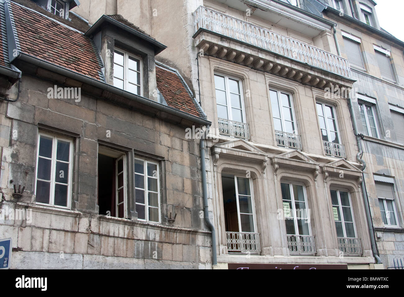 old upper floor homes houses windows roof skylight Stock Photo - Alamy