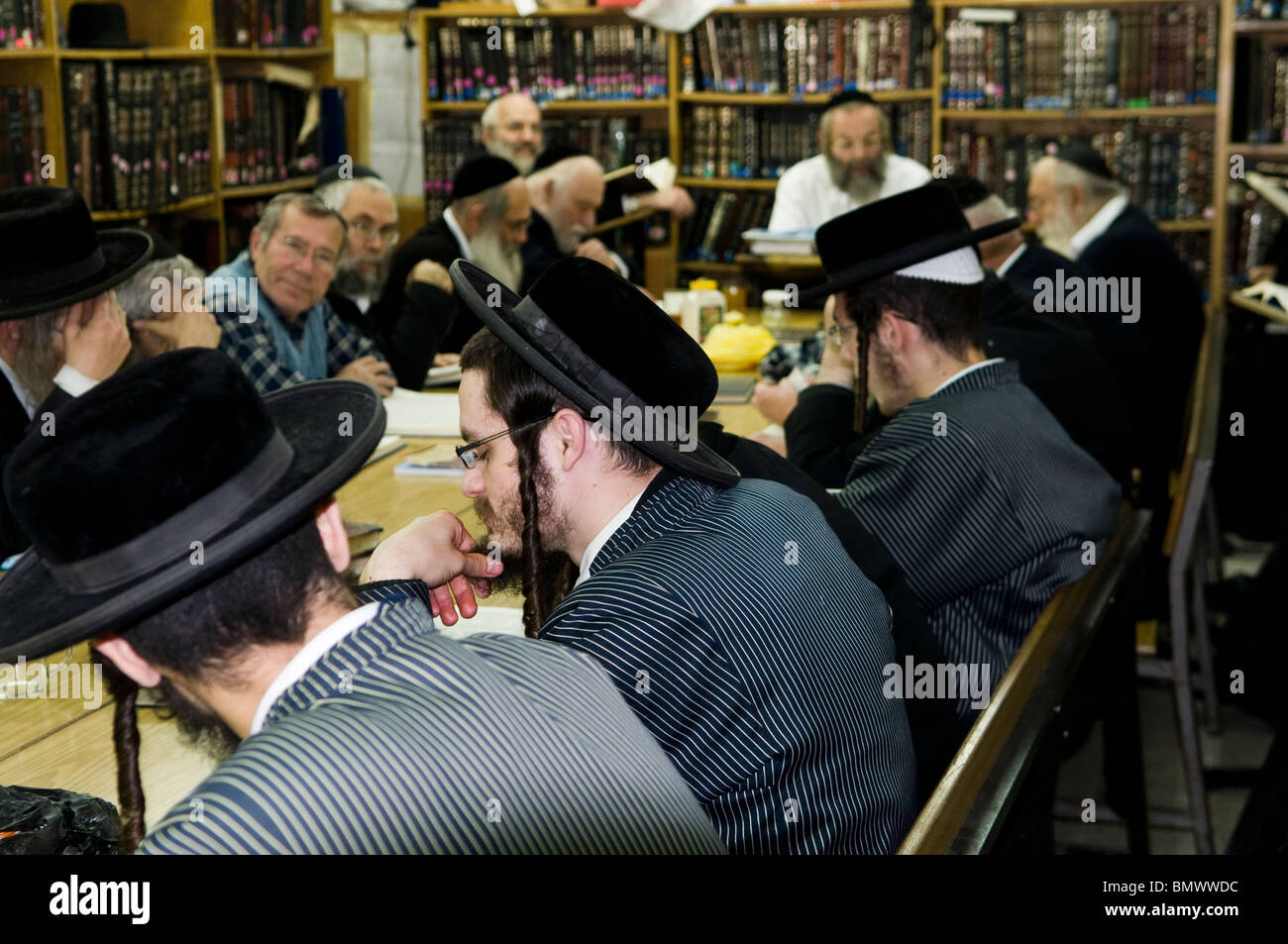A group of Hasidic men studying the bible in a Yeshiva in Mea Shearim ...