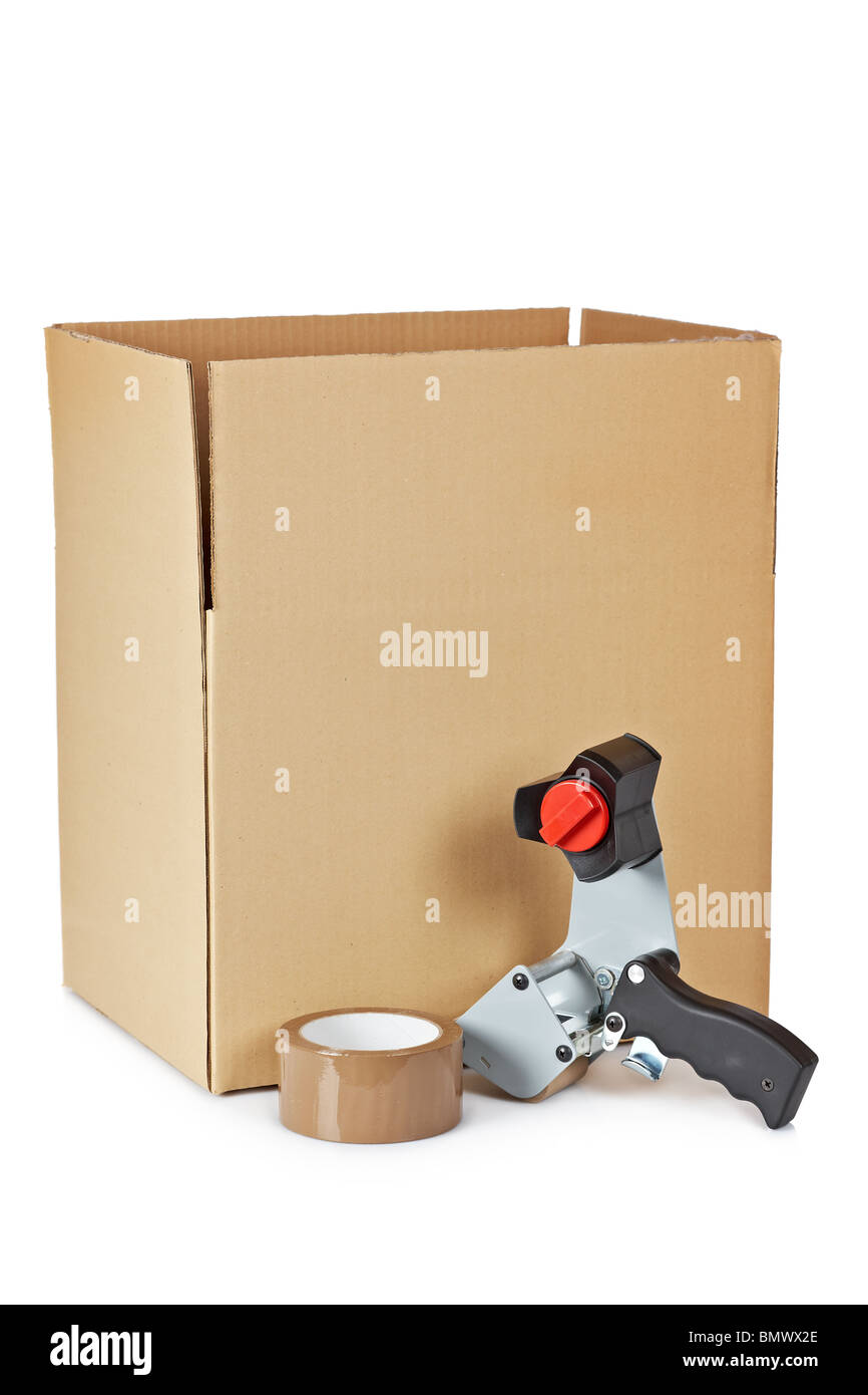 Packaging tape dispenser and shipping box isolated on white background ...