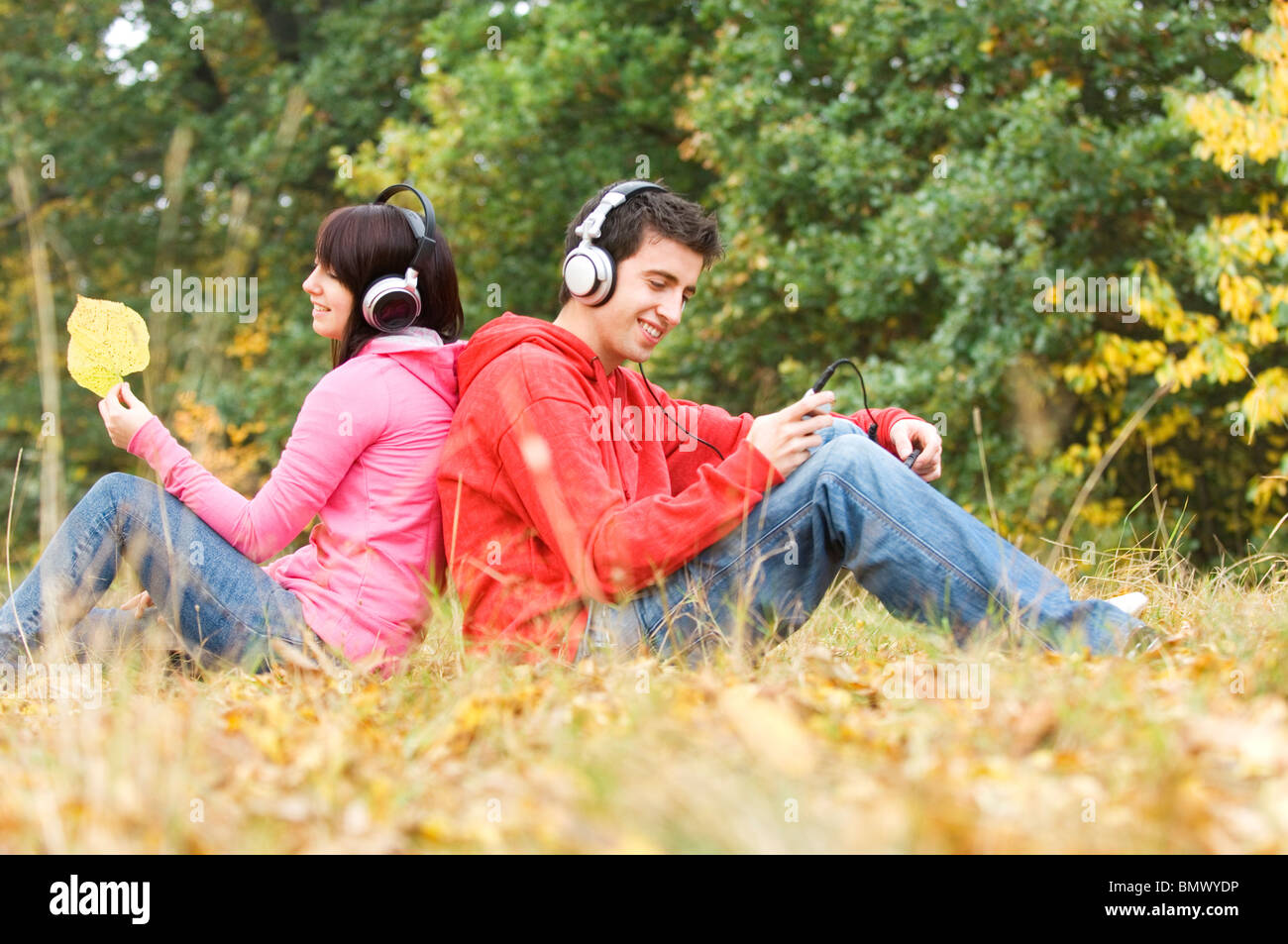 young couple sharing music Stock Photo - Alamy