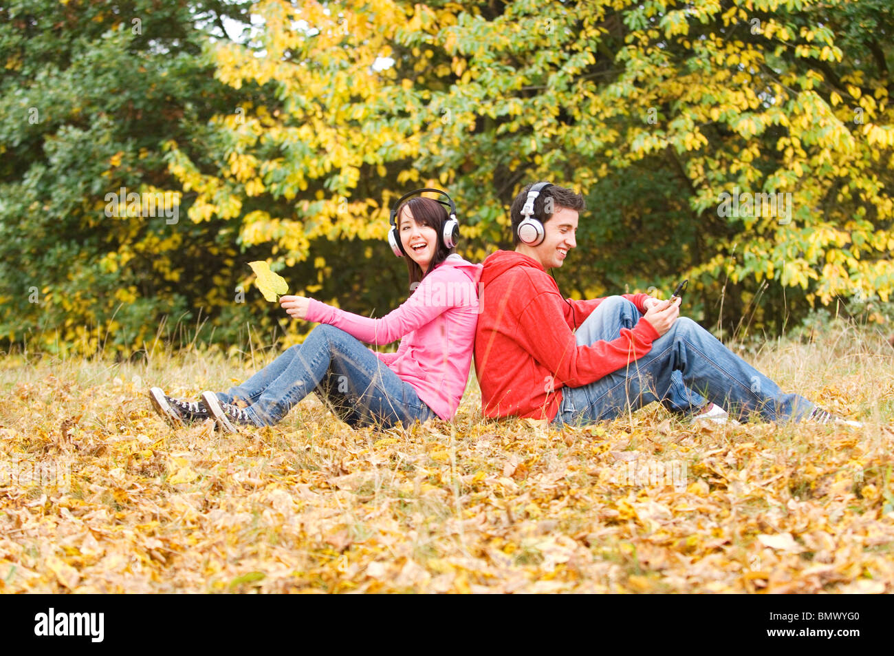 young couple sharing music Stock Photo - Alamy