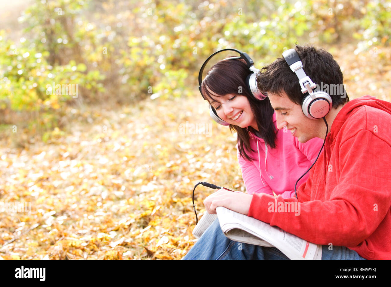 young couple sharing music Stock Photo - Alamy