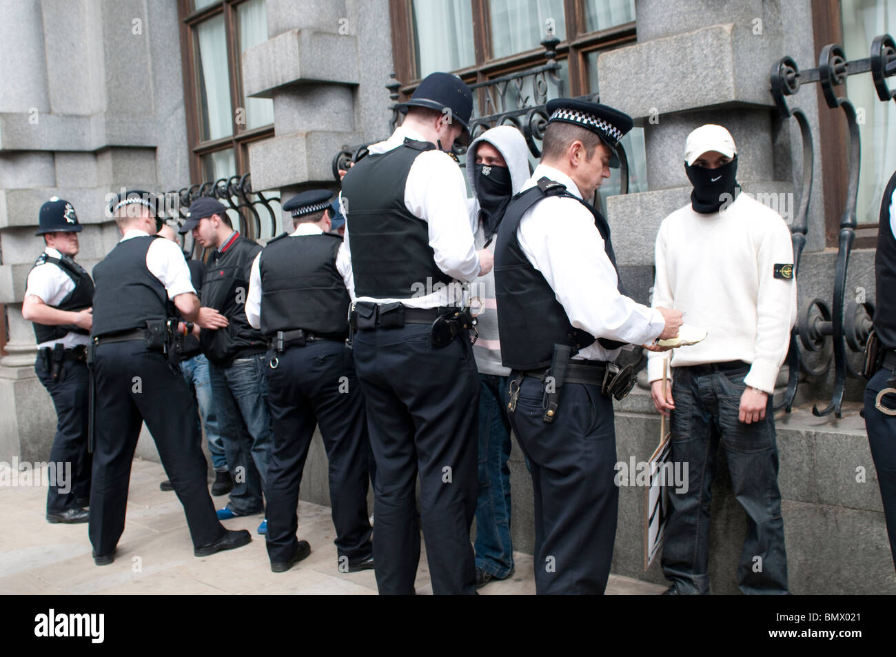 Police search members of English Defense League (LDF), Whitehall ...