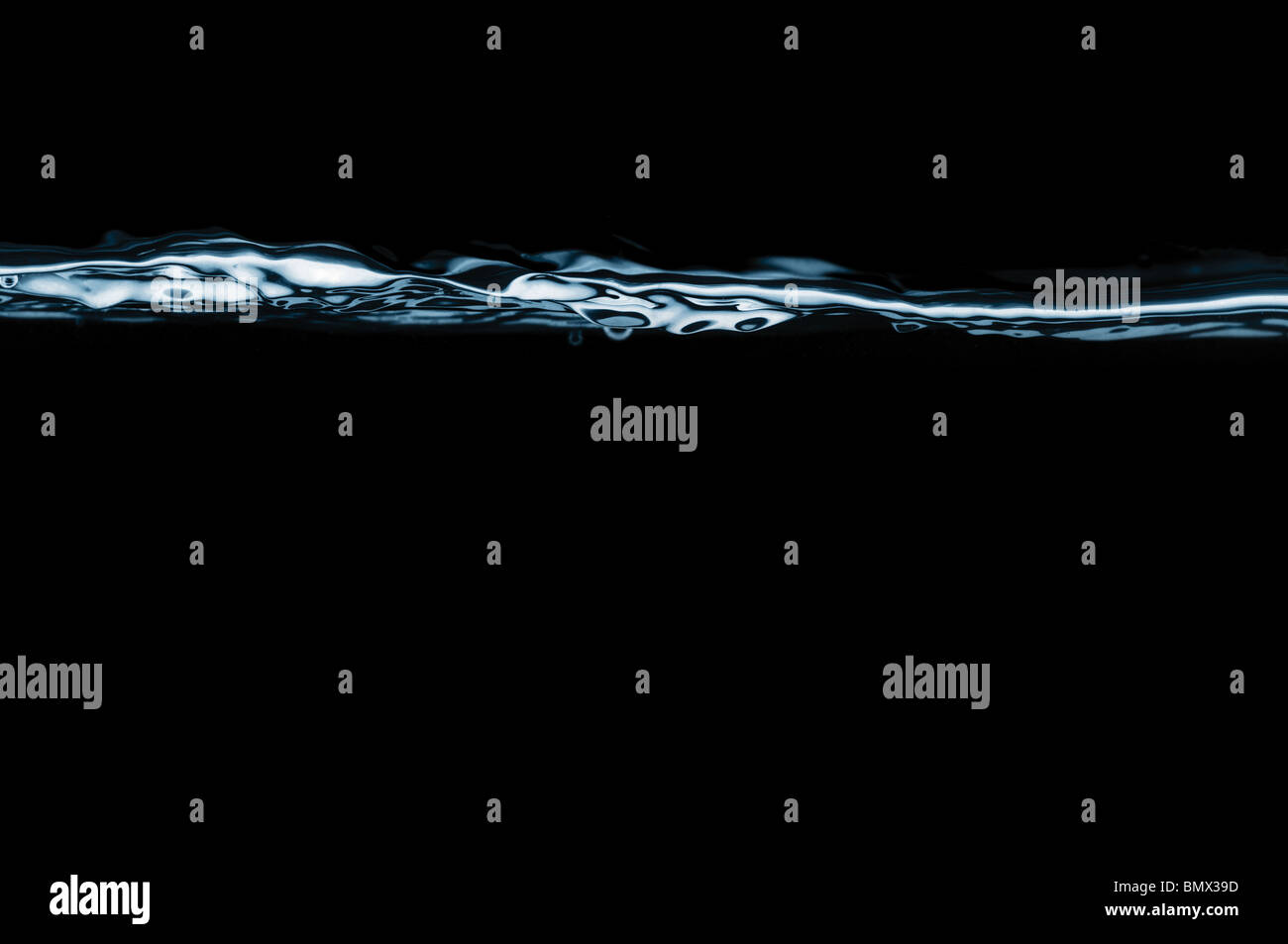 closeup of water waves isolated on black Stock Photo - Alamy