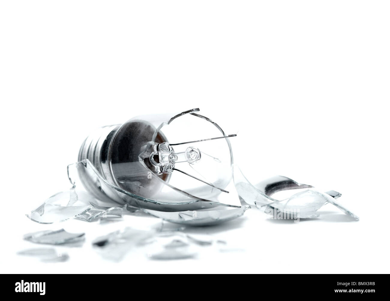 Broken lightbulb on white background Stock Photo - Alamy
