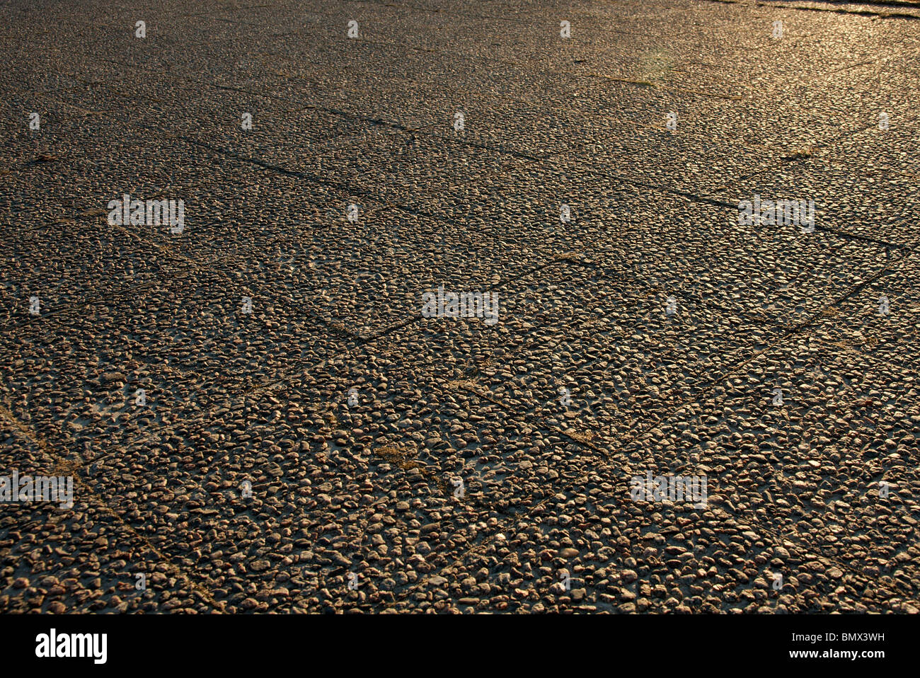 Stone pavement texture i the light of the setting sun Stock Photo - Alamy