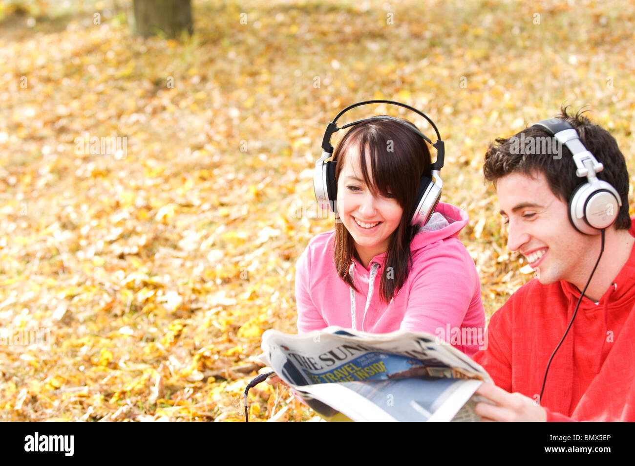 young couple sharing music Stock Photo - Alamy