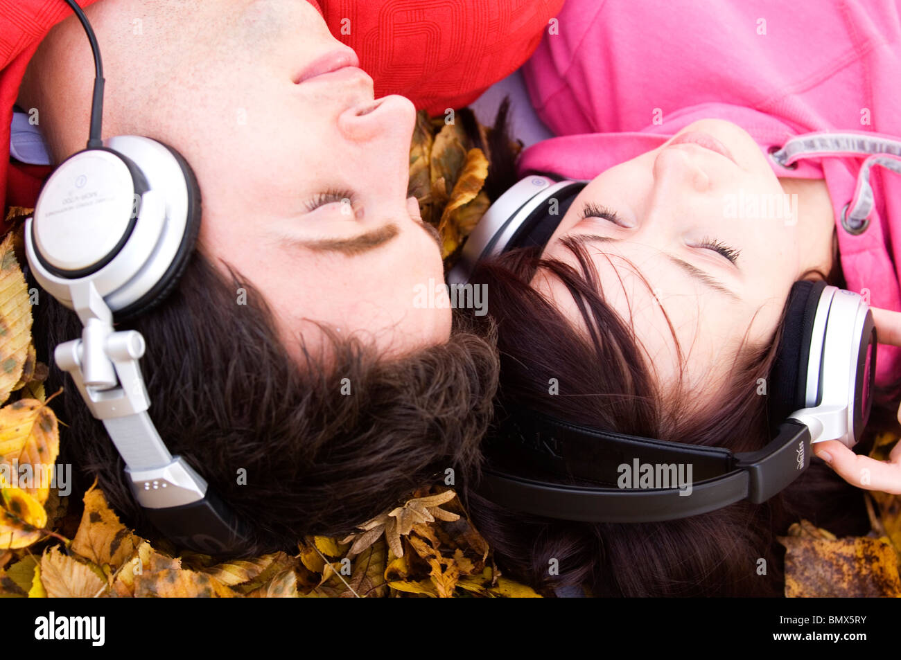 young couple sharing music Stock Photo - Alamy